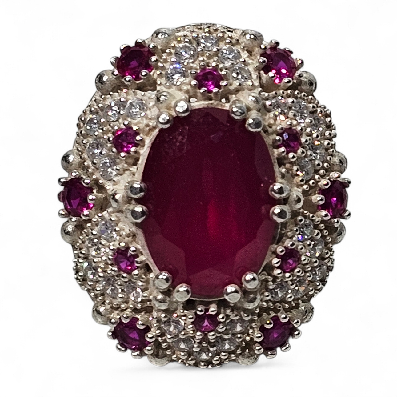Large ruby zircon ring with a carved and silver-tinted frame. NO. 11 ...