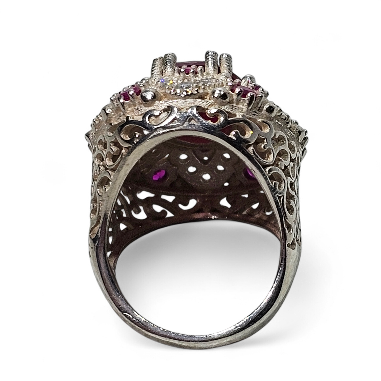 Large ruby zircon ring with a carved and silver-tinted frame. NO. 11 ...