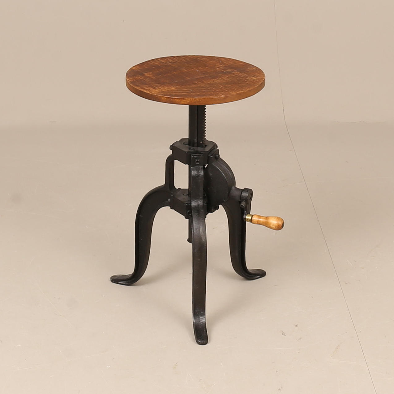 A wooden and cast iron stool, 19th/21st century. Furniture - Other ...