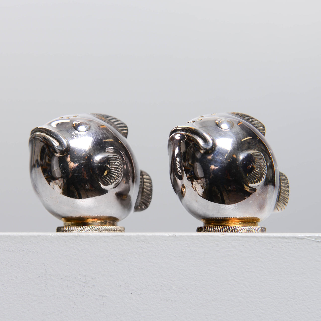 A pair of salt and pepper pots, nickel silver, GAB, later part of the ...