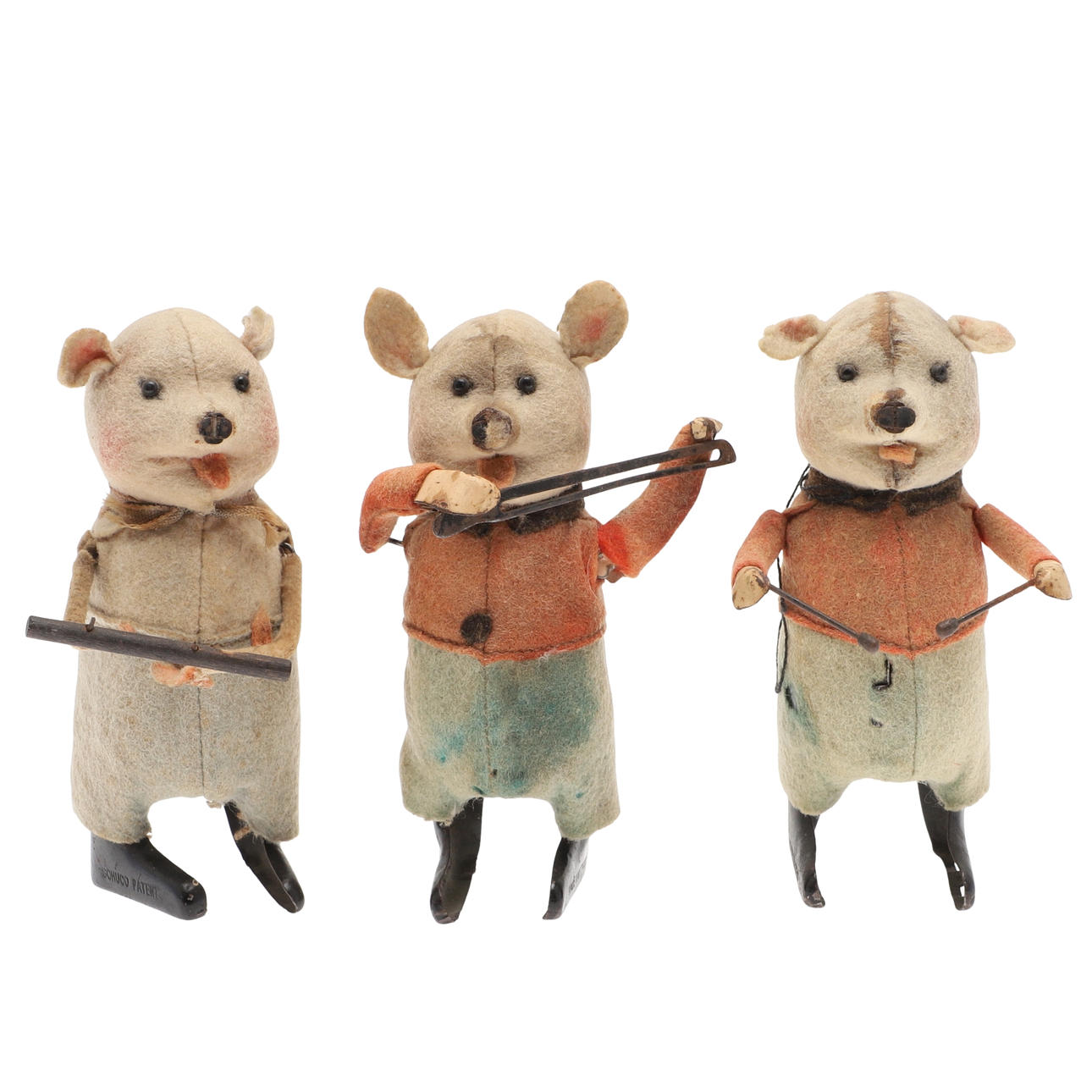 THREE SCHUCO CLOCKWORK MUSICAL PIGS. Toys - Toys - Auctionet