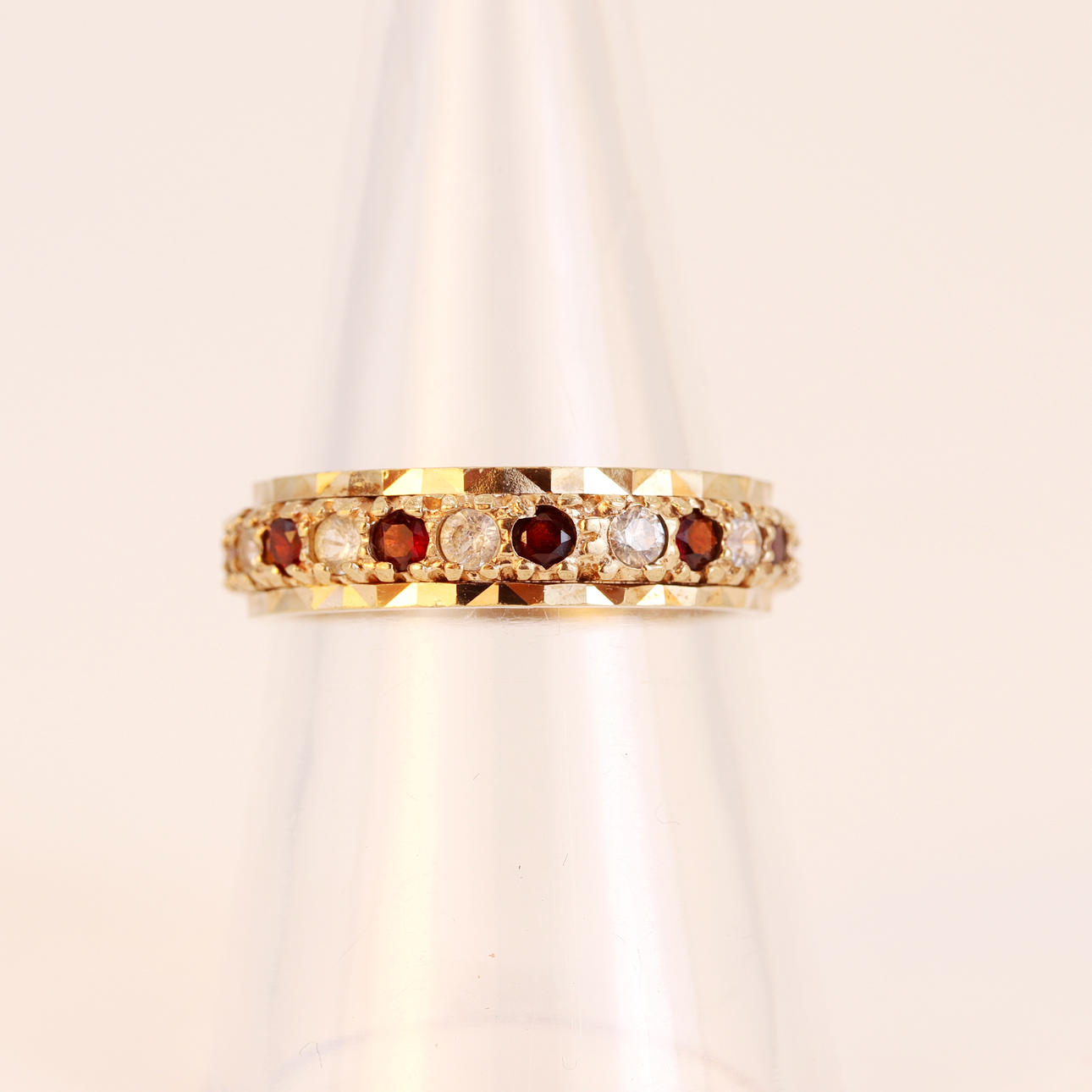 9CT GOLD GARNETS AND WHITE STONE SET RING. Jewellery & Gemstones ...