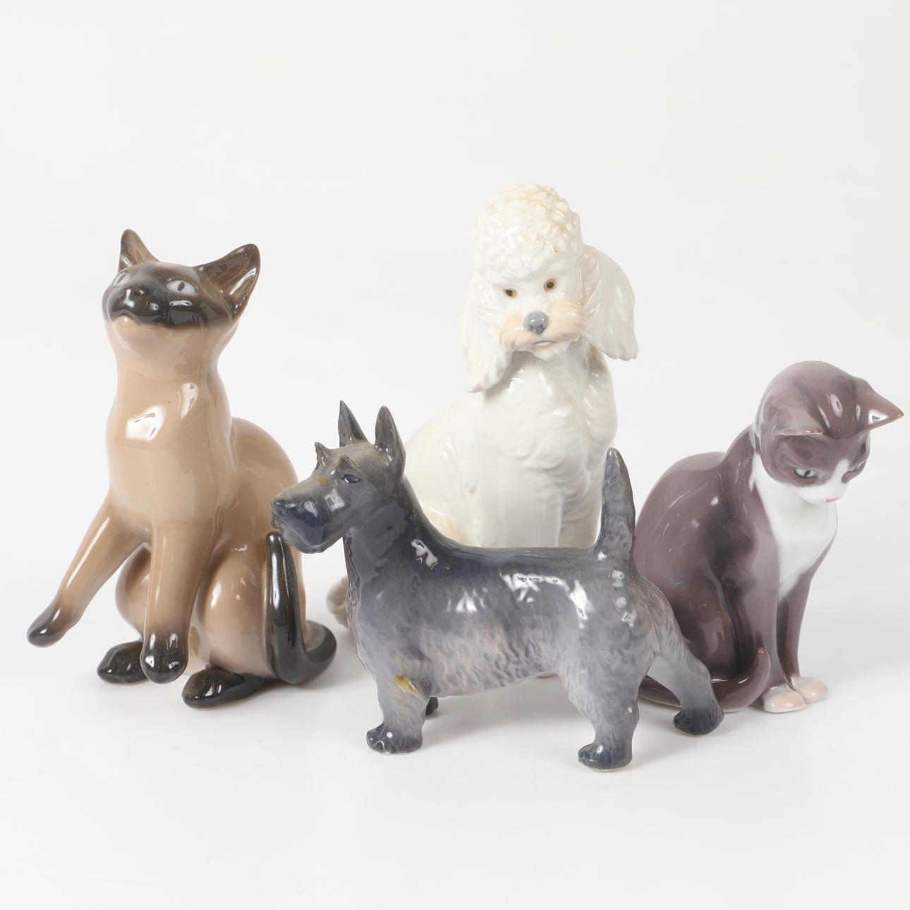 FIGURINES, 4 pieces, porcelain, Royal Copenhagen, Bing & Gröndahl and ...