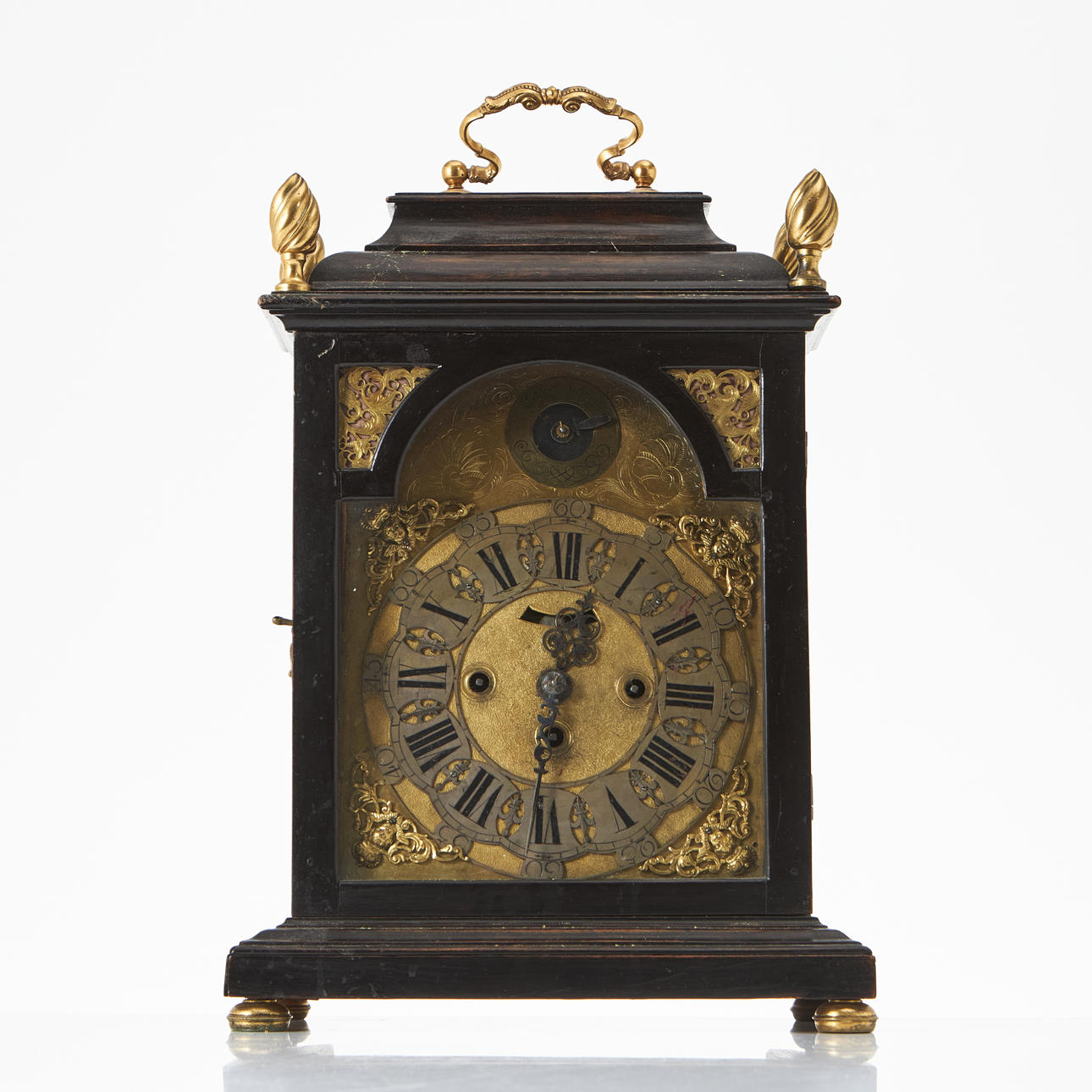 A 17th-century library clock, blackened case, brass details, dial with ...