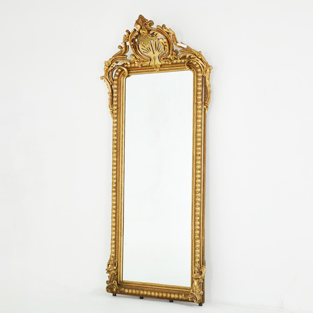 A Neo-Rococo floor mirror, second half of the 19th century, gilt ...