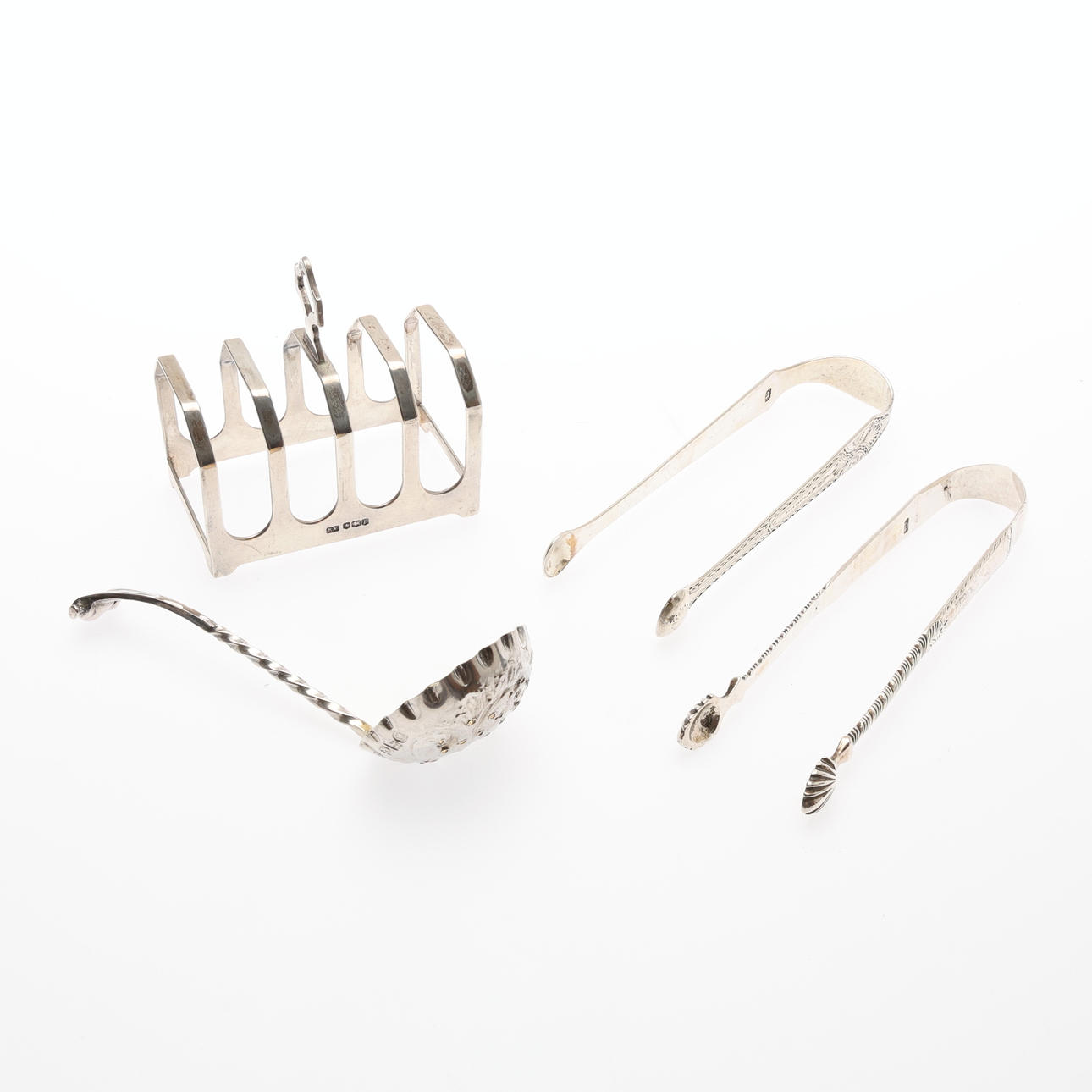 2 PAIRS OF GEORGE III SILVER SUGAR TONGS, VICTORIAN SUGAR SIFTER, AND A ...