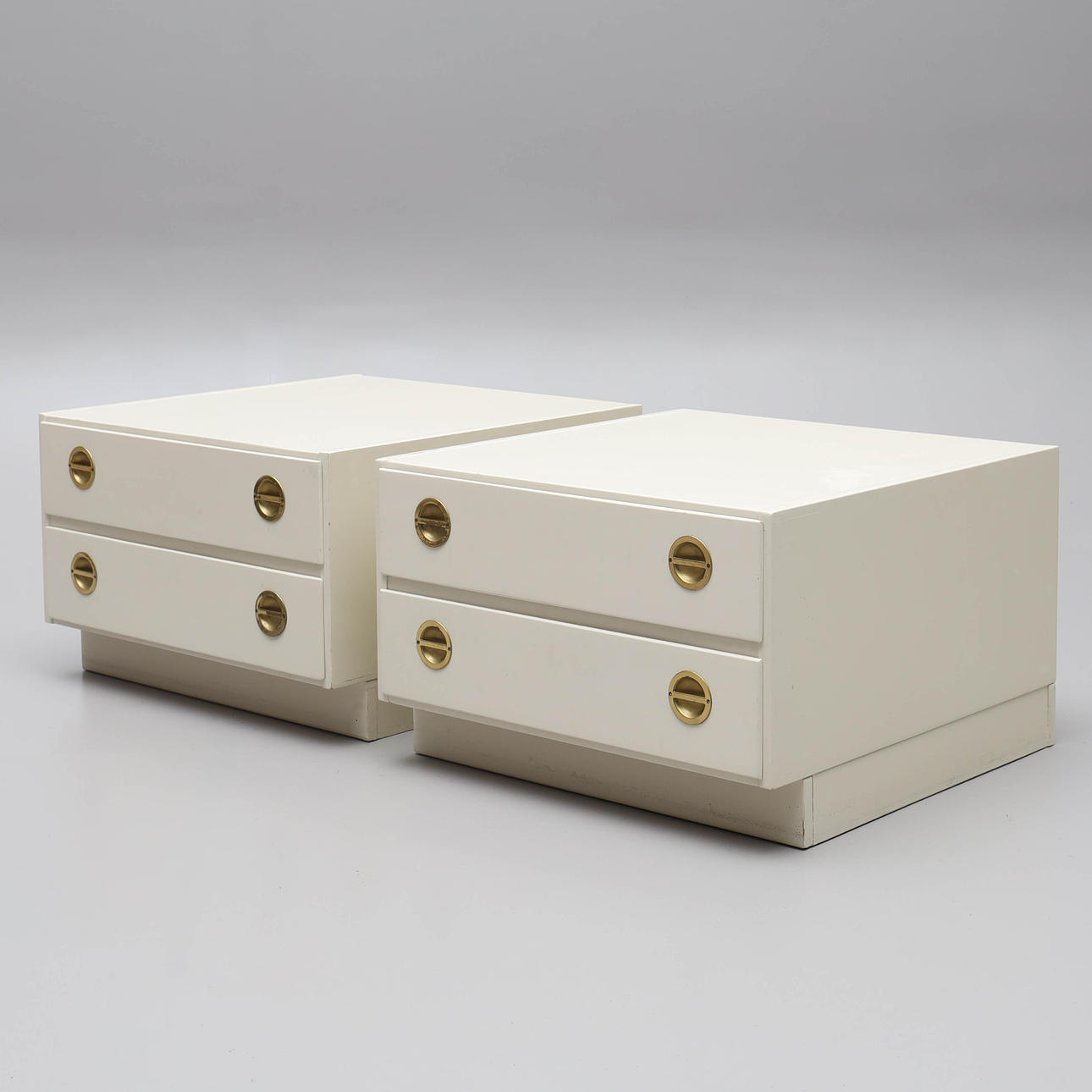THOMAS JELINEK. A pair of white lacquered “Fembo” dressers/bedside ...