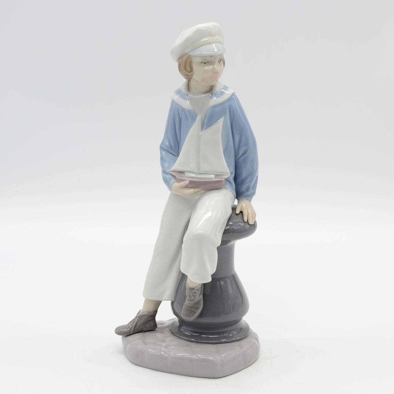 SALVADOR FURIÓ. LLARDO, “BOY WITH YACHT”, SCULPTURE, PORCELAIN, PAINTED ...
