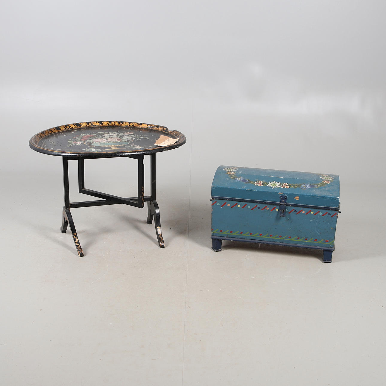 A VICTORIAN PAPER MACHE FOLDING TRAY TOP TABLE, AND A PAINTED CHEST ...