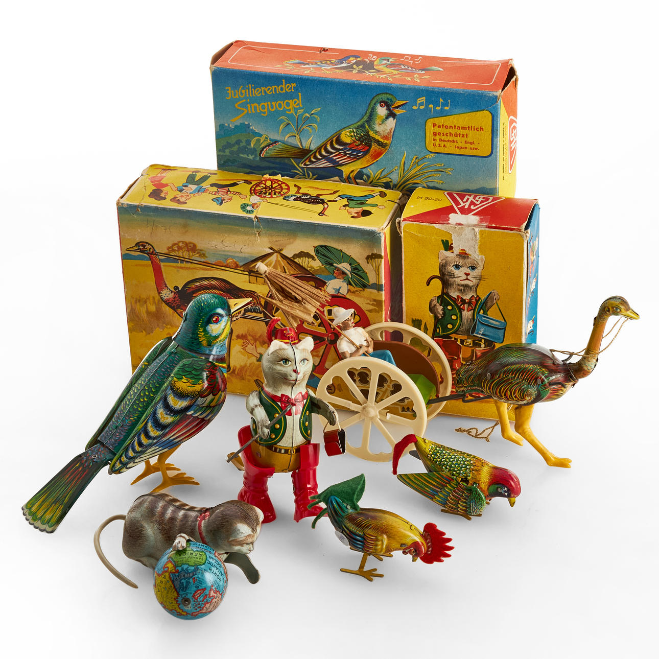 SIX GERMAN MECHANICAL TOYS, circa mid 20th century, lithographed sheet ...