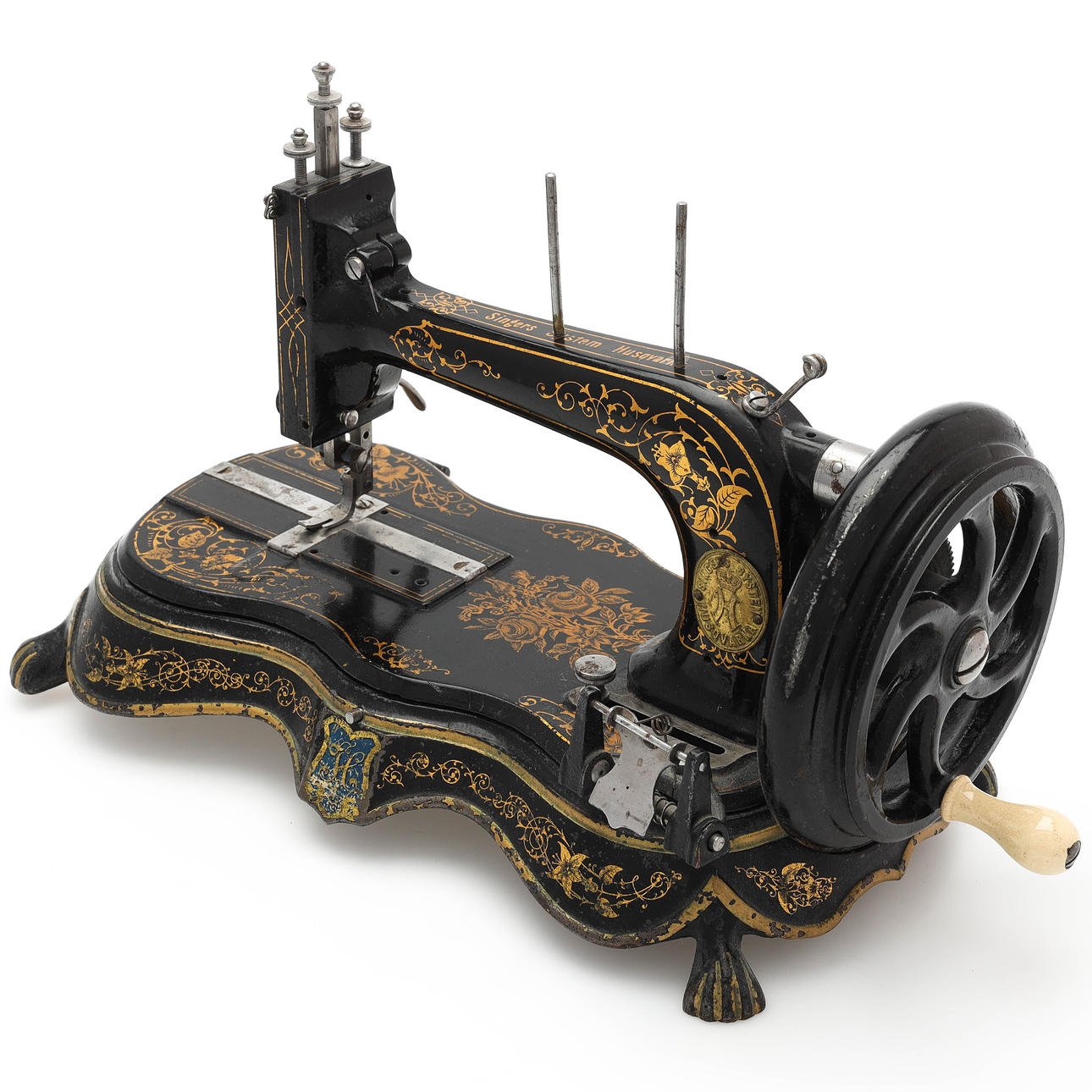 A hand-operated, cast iron sewing machine, Singers System, Husqvarna ...