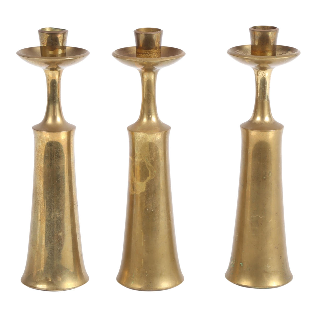 JENS HARALD QUISTGAARD. Danish Designs. Set of three brass candlesticks ...