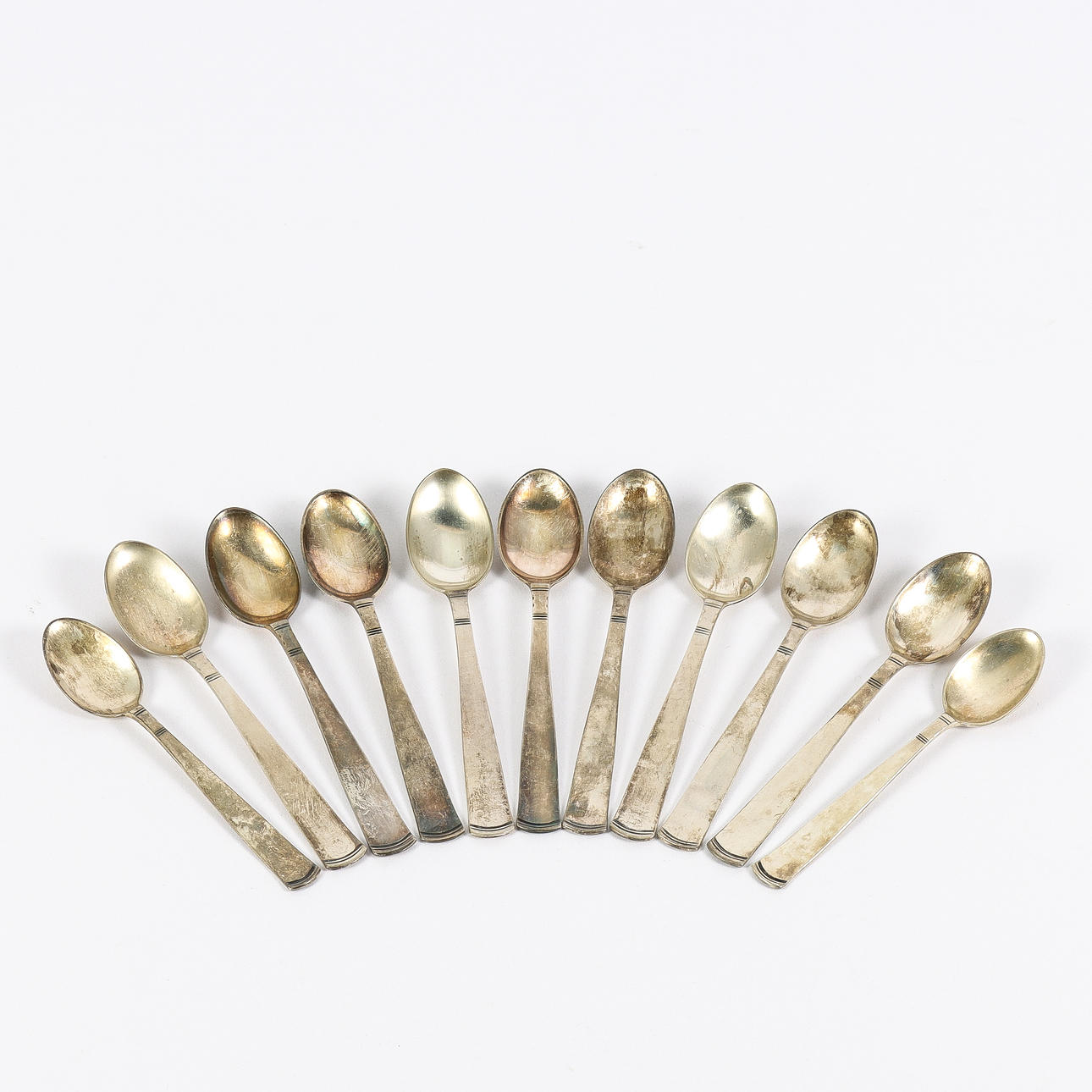 JACOB ENGMAN. Rosenholm, 9 coffee spoons and 2 suede spoons, silver ...