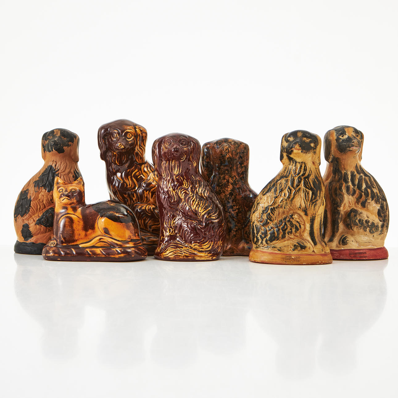 A set of 7 earthenware savings boxes, early 20th century, probably ...