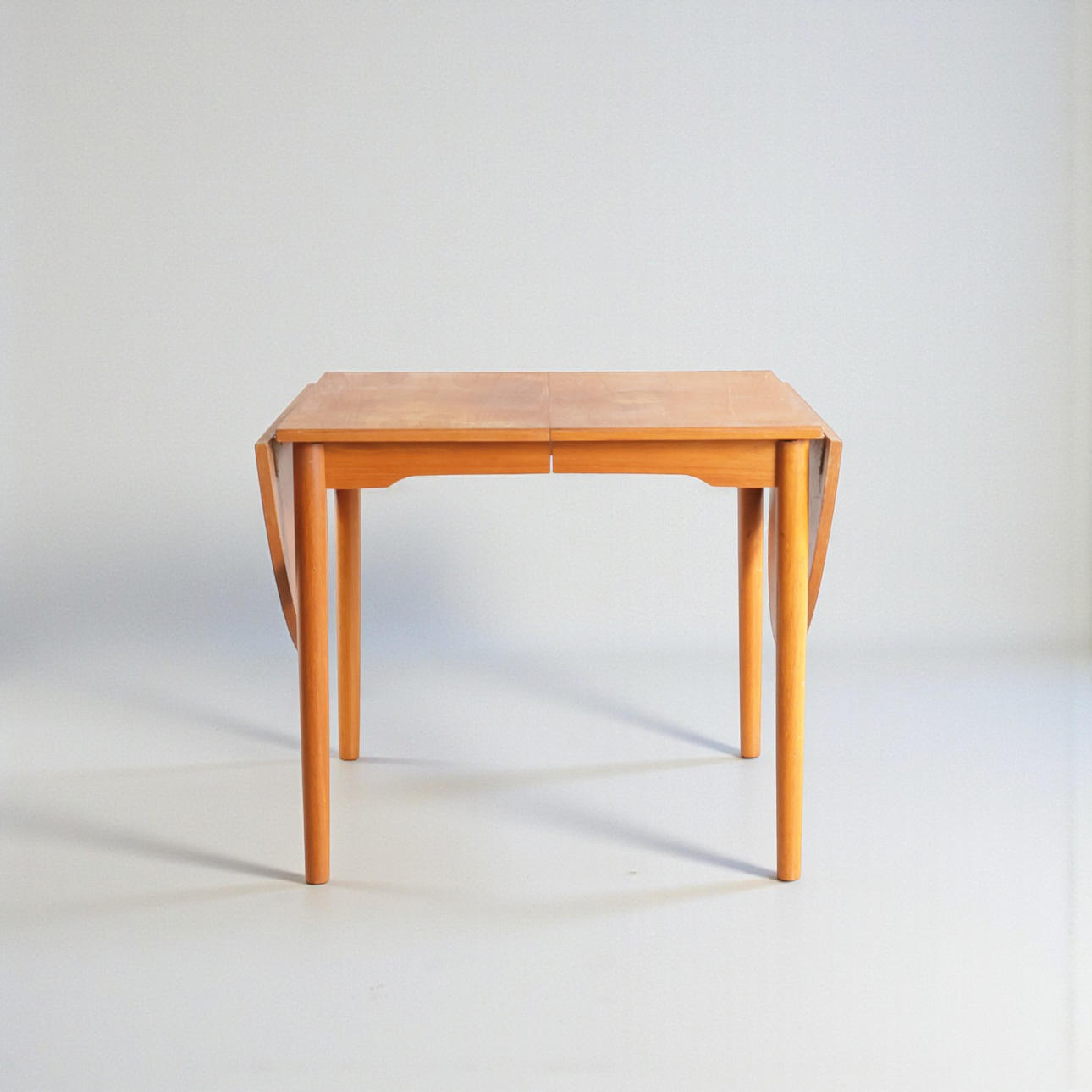 Square teak dining table with pull-out, included additional plates and ...