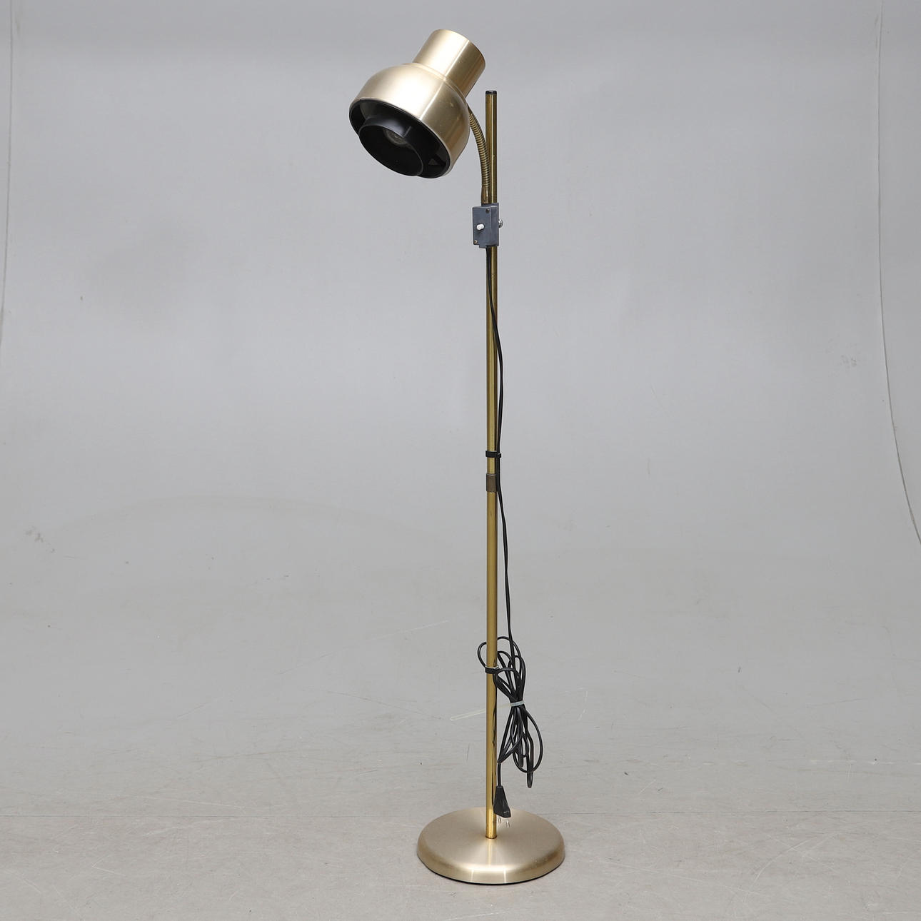 A plastic and yellow metal floor lamp, Elidus, second half of the 20th ...