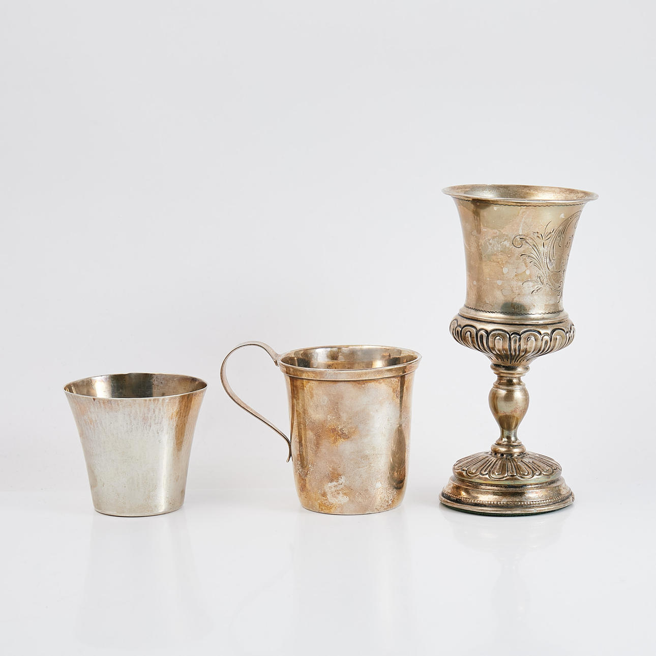 TROPHY and BEAKER, 3 dlr, silver, punched and ciseled decoration, mixed ...