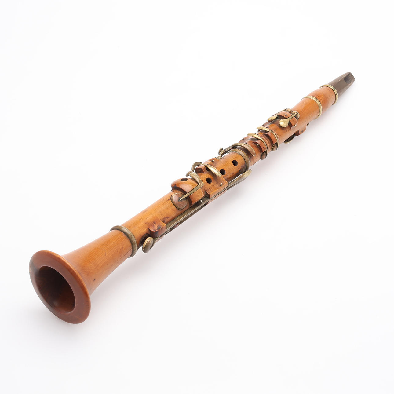 AN ANTIQUE CLARINET, cut from fruit wood. Collectables - Musical ...