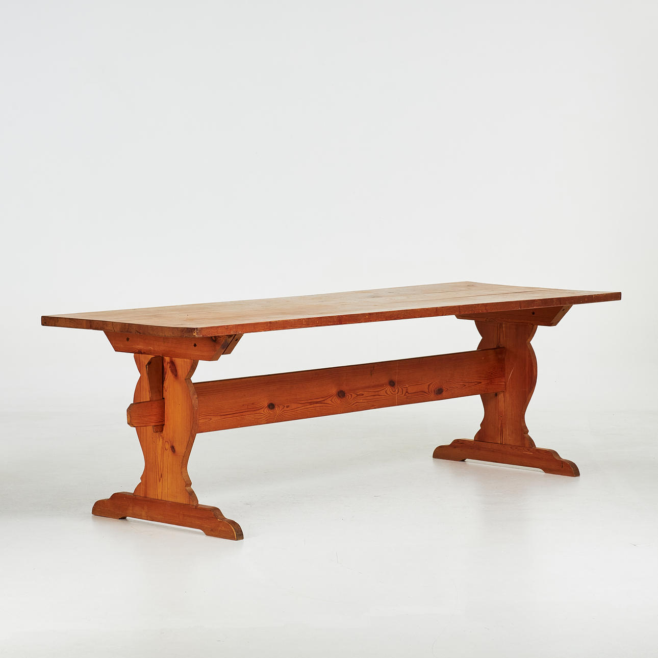 A 20th century trestle table, pine, divisible leg stand, sheet soldered ...