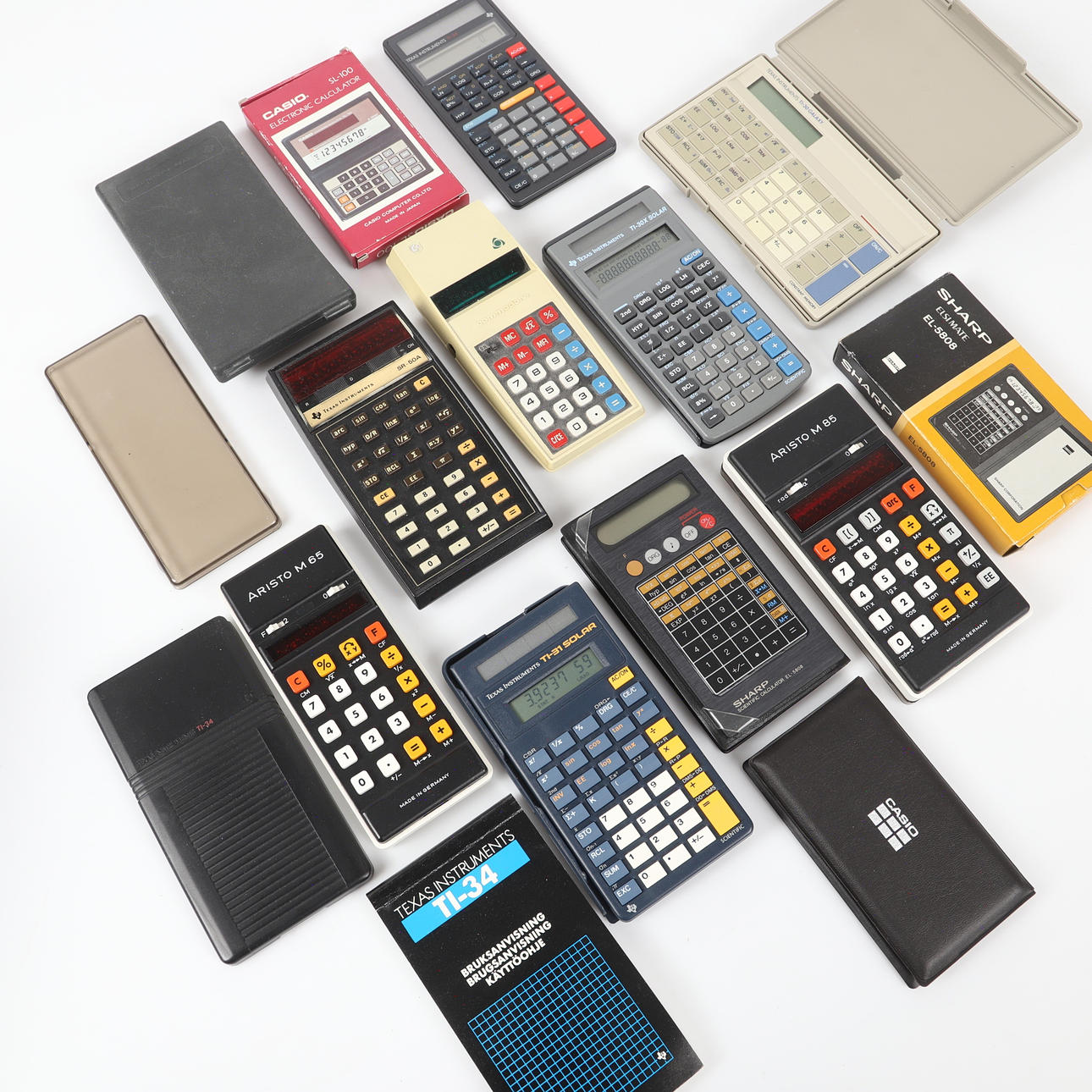 A set of 11 calculators, second half of the 20th century. Miscellaneous ...
