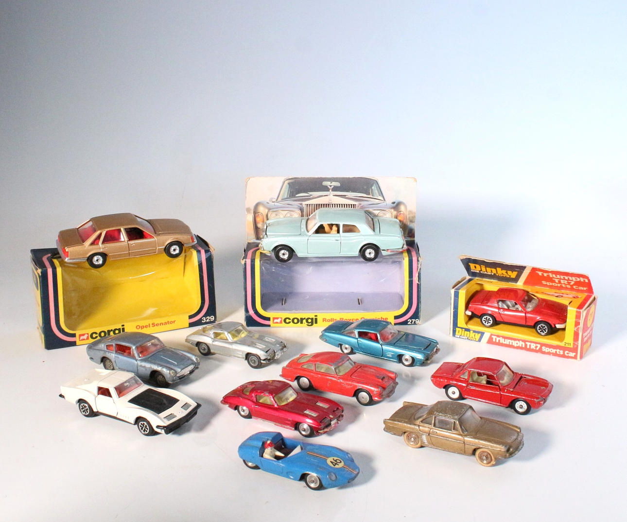 A collection of 12 model cars from Corgi Toys, Dinky Toys, Mercury and ...