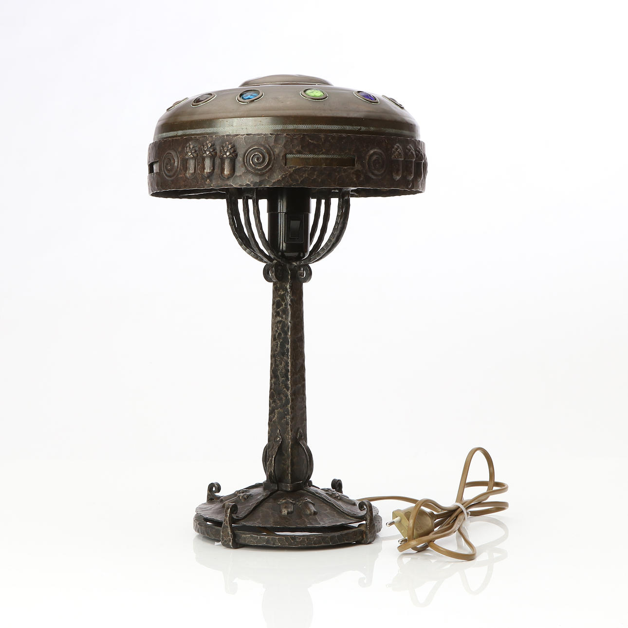 BÖHLMARKS, TABLE LAMP. Hammered forging, brass plate screen with ...