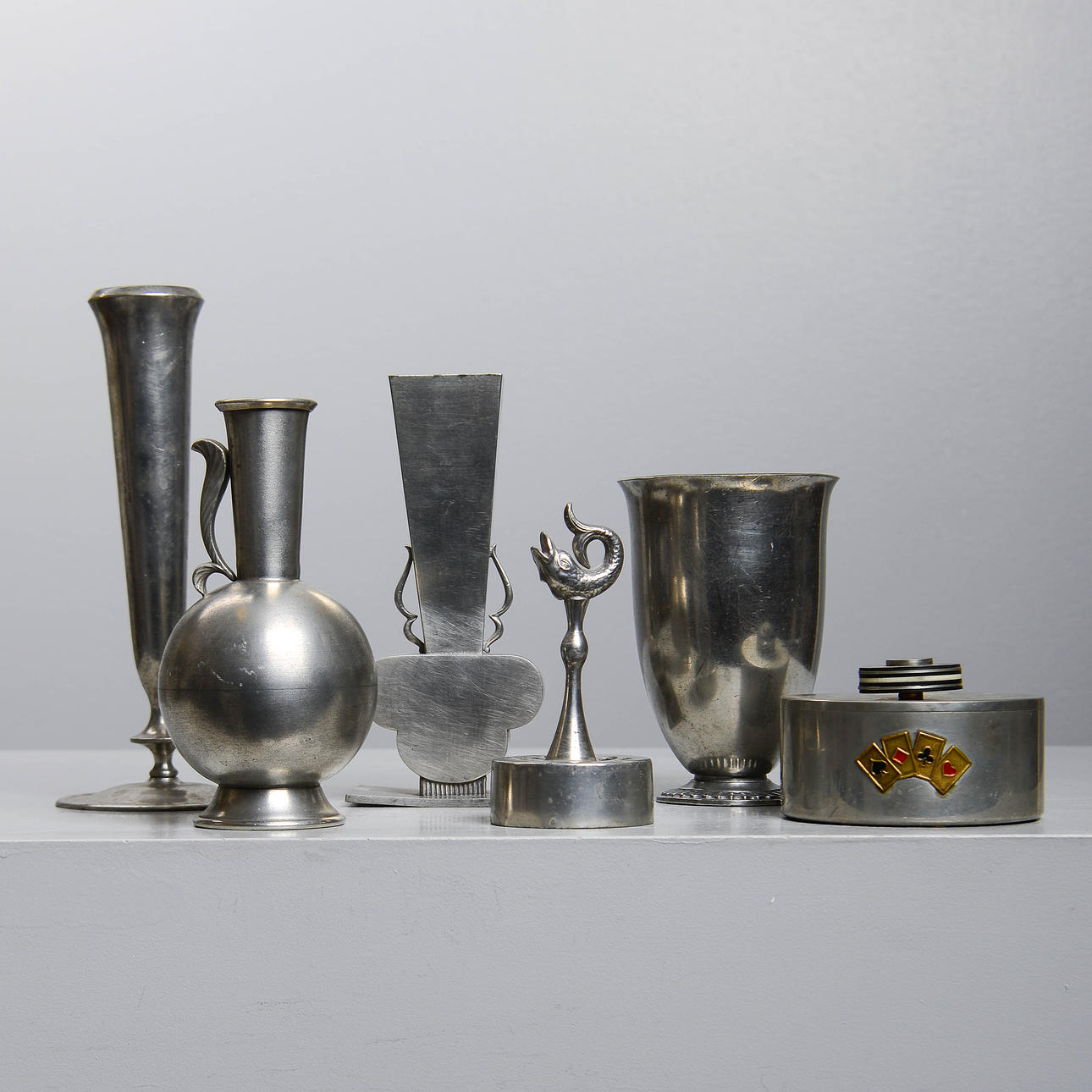 A set of 6 pewter objects, earlier part of the 20th century. Silver ...