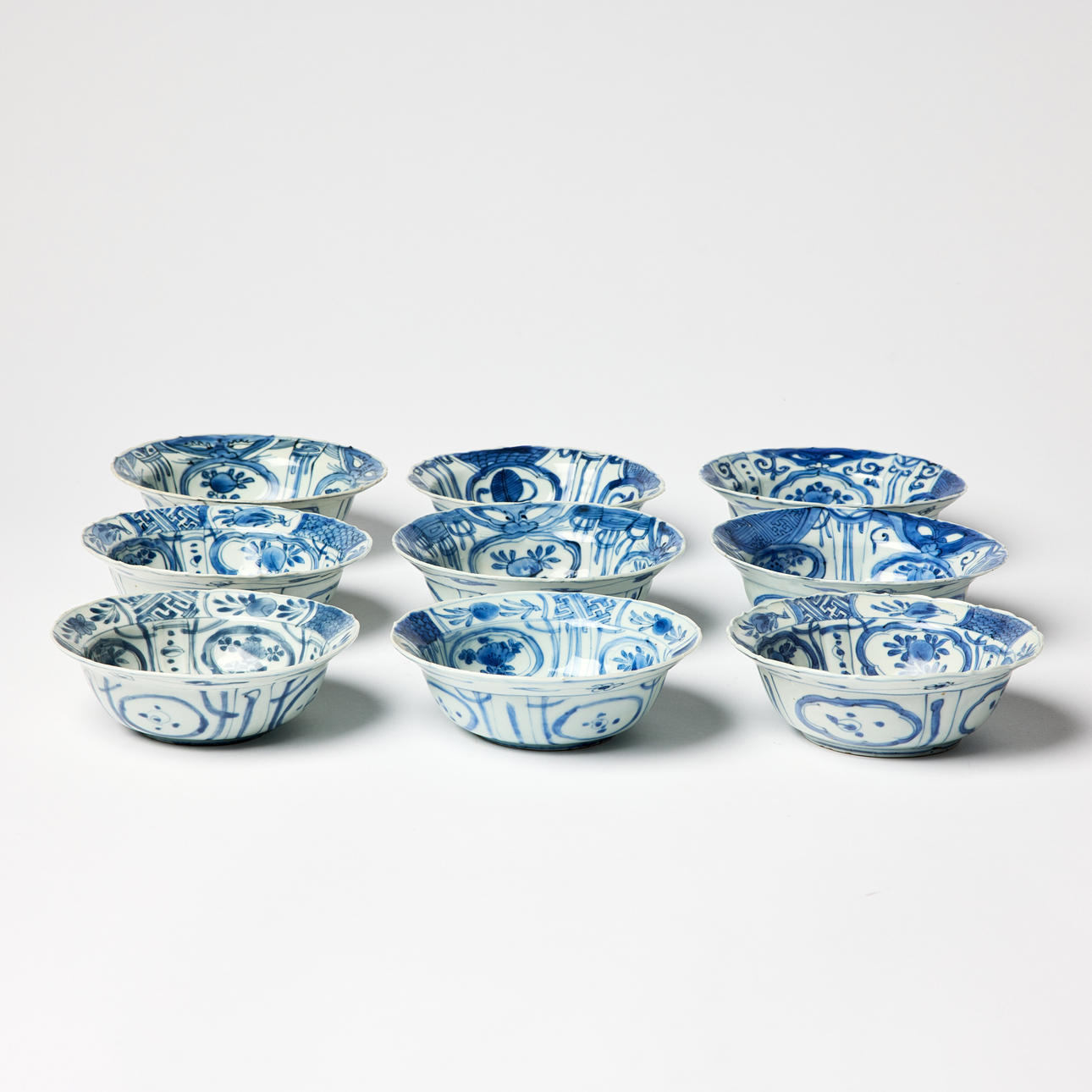 Nine Chinese Blue and White Moulded 'Kraak' Dessert Bowls. Asiatika ...