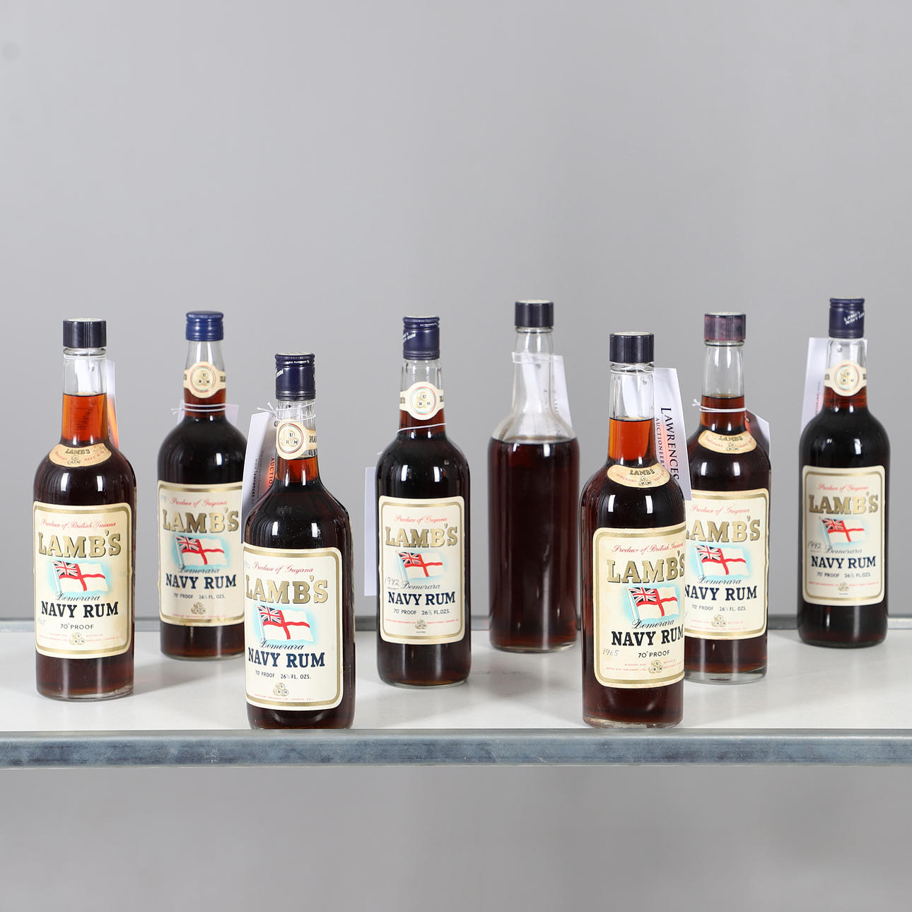 A QUANTITY OF LAMBS NAVY RUM. Wine, Port & Spirits - Auctionet