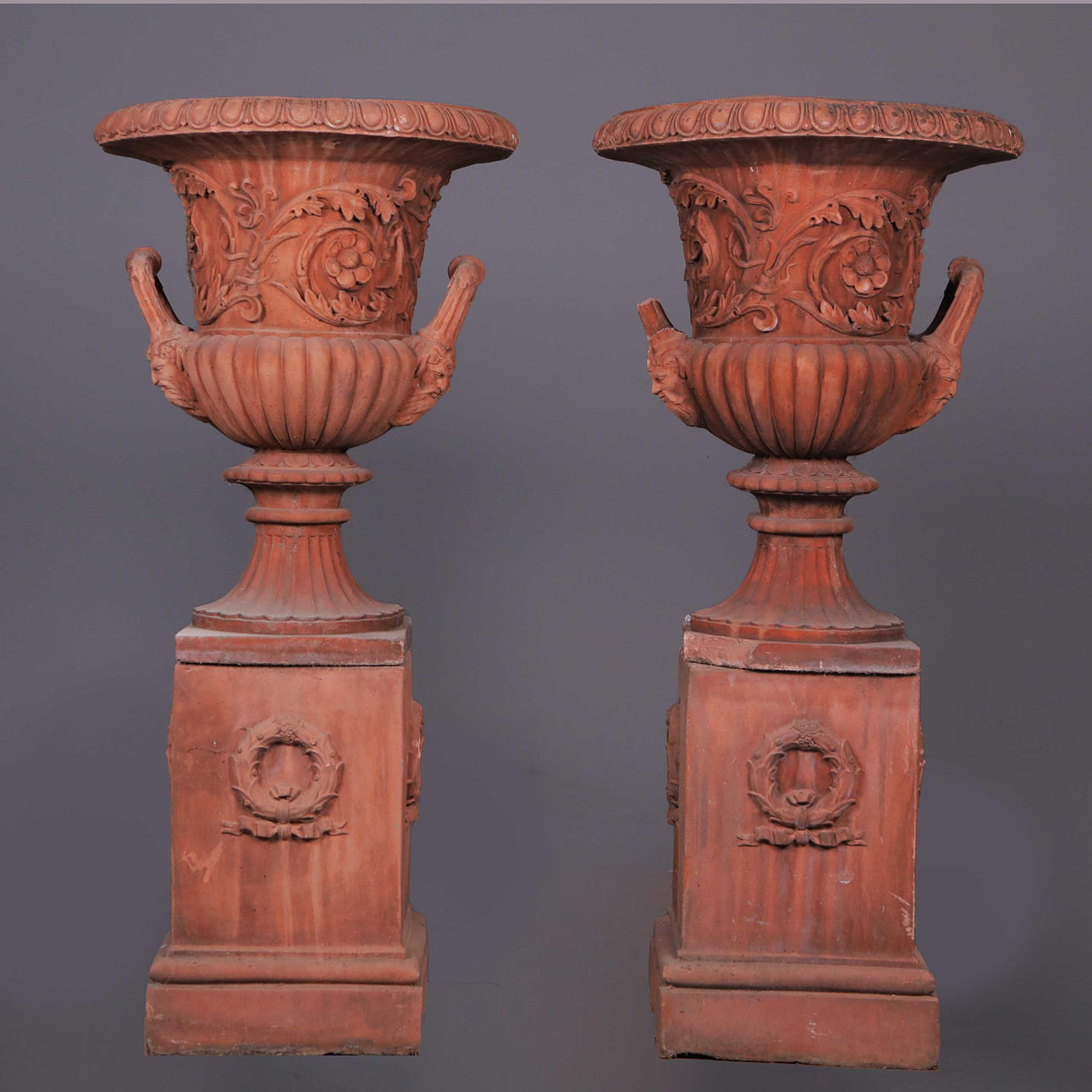 A PAIR OF LARGE TERACOTTA GARDEN URNS ON STANDS (2). Garden ...