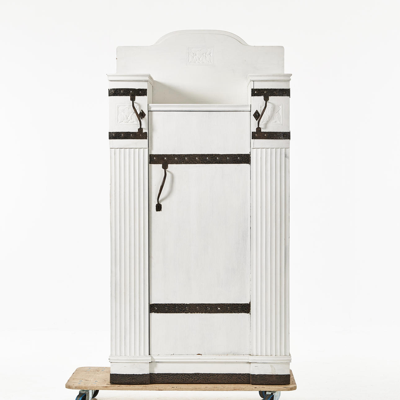 A cupboard, early 20th century, Art Nouveau, cut decor, wrought iron ...