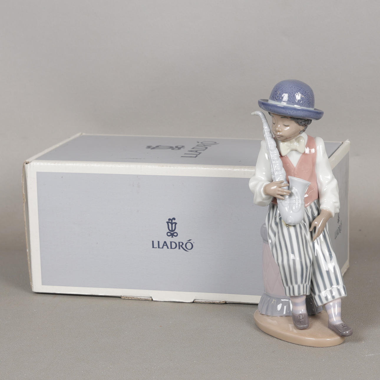 LLADRO 'JAZZ SAX' FIGURE. Ceramics & Porcelain - European - Auctionet