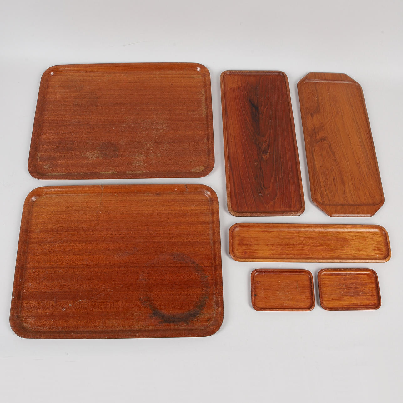 A set of 7 teak trays, among others Karl Holmberg, 1960s/1970s ...