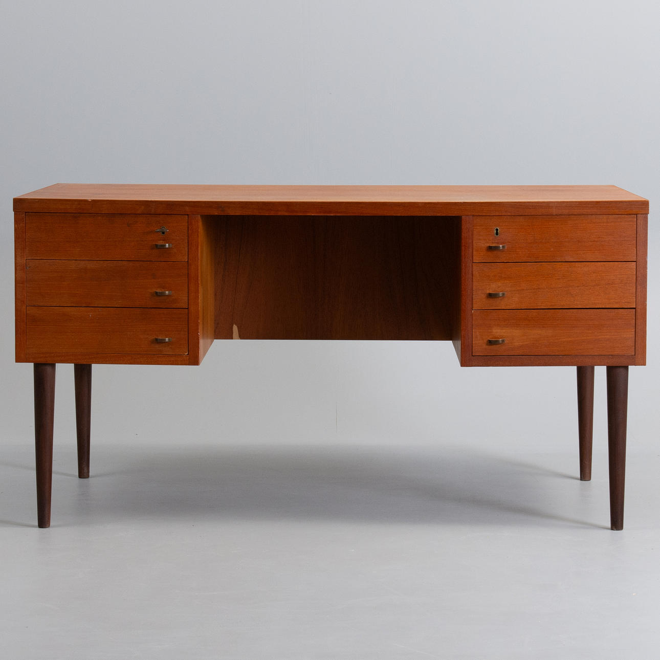 DANISH FURNITURE DESIGN. Freestanding teak desk with brass handles ...
