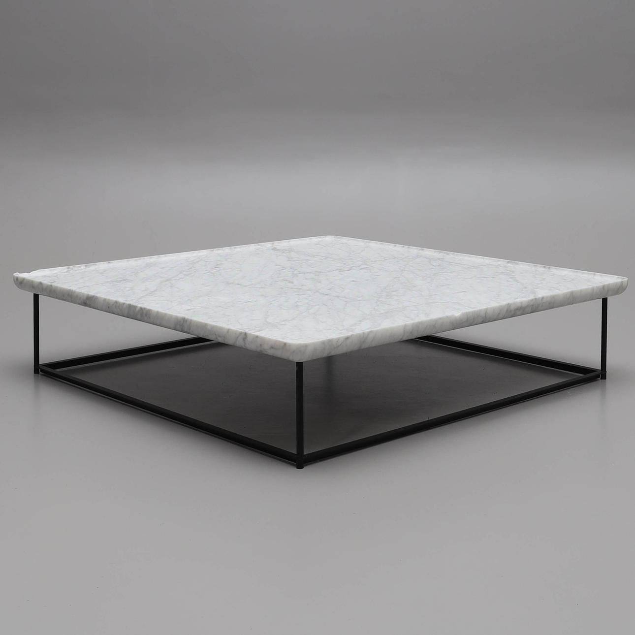 LUCA NICHETTO. Coffee table, top in Carrara marble, legs in blackened ...