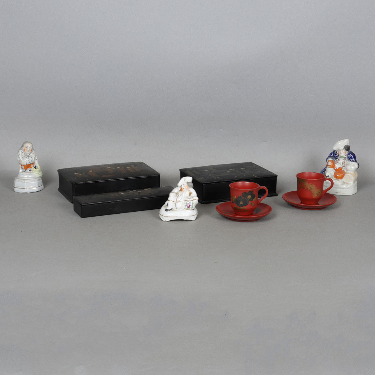 THREE CHINESE LAQUERED BOXES, A PAIR OF CHINESE RED PAPIER MACHE CUPS ...