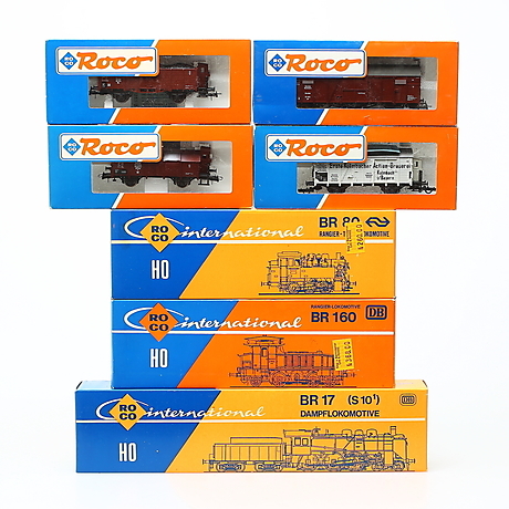 ROCO three locomotives and 4 wagons in original boxes. Toys - Auctionet