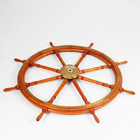 SHIP'S STEERING WHEEL, wood and brass, belonging to the ship Ole Wegger ...