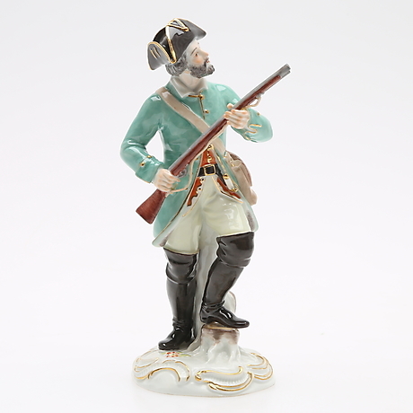 FIGURE IN THE SHAPE OF A HUNTER, porcelain with painting in colors ...