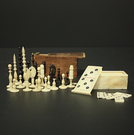 CHESS PIECES/DOMINOS, 58 pieces, legs, 19th century, belonged to the ...
