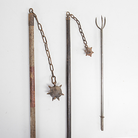 Two medieval style flails in wrought iron and wood and harpoon-trident ...
