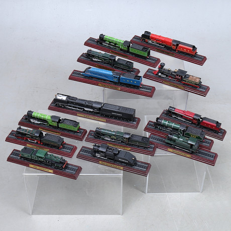 MODEL LOCOMOTIVE in plastic on a wooden base with rails, about 14 ...