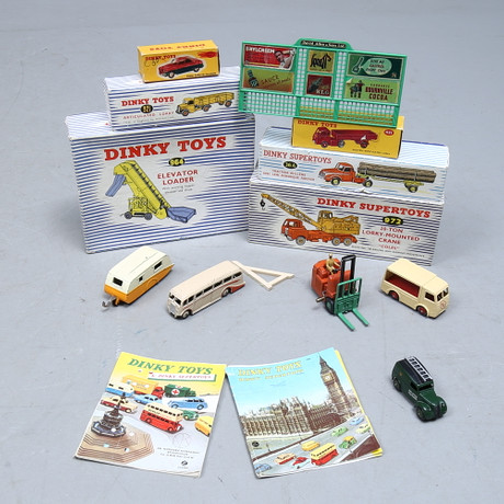DINKY 7 items of which 2 in original boxes, 4 empty boxes, sign and 2 ...