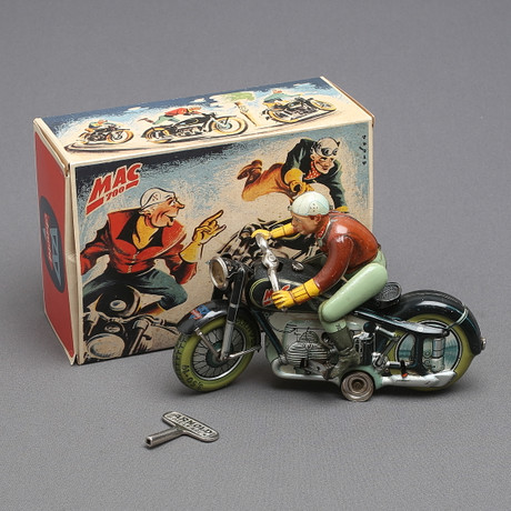 ARNOLD MAC 700 motorcycle in sheet metal, clockwork. Original box with ...