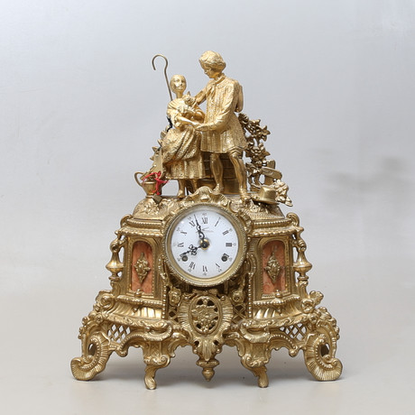 TABLE CLOCK, brass and marble in window, rococo style, dial marked ...