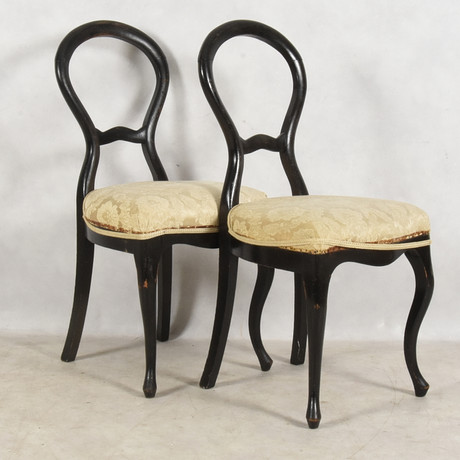 CHAIRS, a pair, painted black, rococo style, first half of the 20th ...