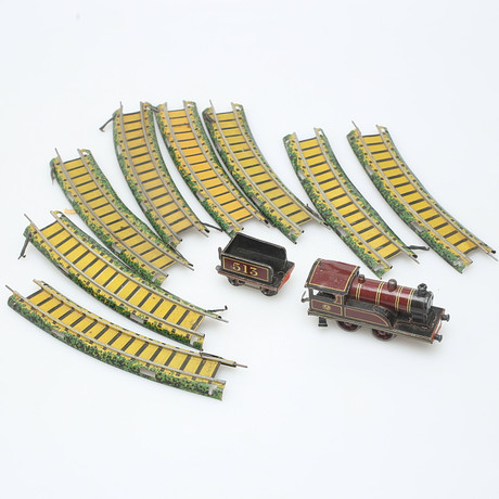 GERMAN clockwork steam locomotive with rails. Toys - Auctionet