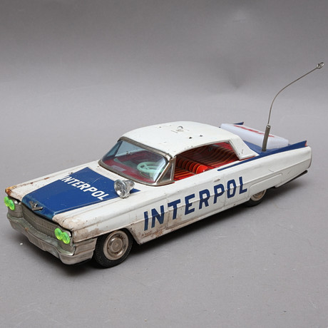 TIN CAR, Interpol police car, Cadillac, Ichiko, Japan. Toys - Auctionet