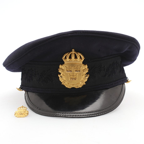 POLISHATT samt polisemblem i gulmetall, 1900-talets andra hälft ...