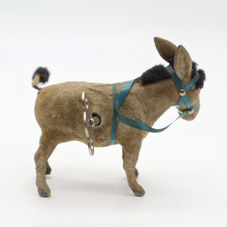 ANTIQUE MECHANICAL WIND-UP DONKEY. Toys - Toys - Auctionet